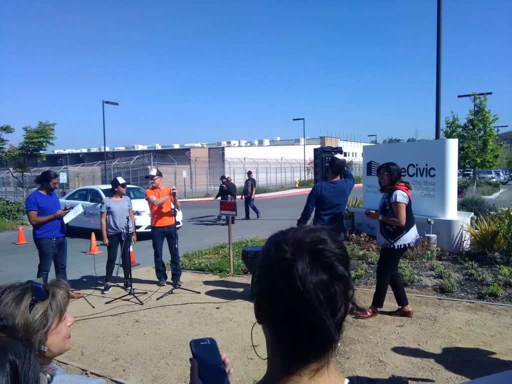 Community rallies for refugees outside private prison in Otay Mesa ...
